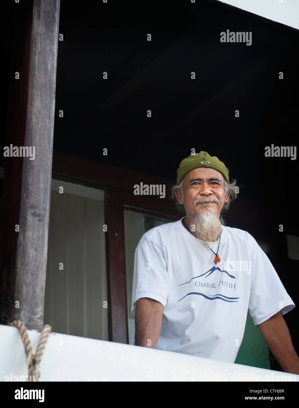 A crewman aboard the "Ombak Putih", a traditional Pinisi schooner ...
