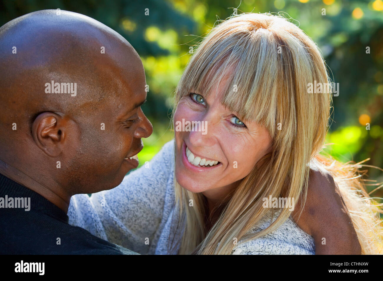 Interracial Married Couple Spending Quality Time Together In A Park ...
