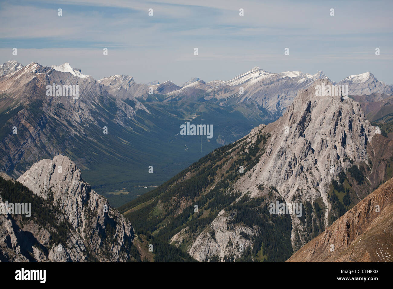 Mountain Peaks And Valley Floor From On Top Of A Mountain; Alberta ...