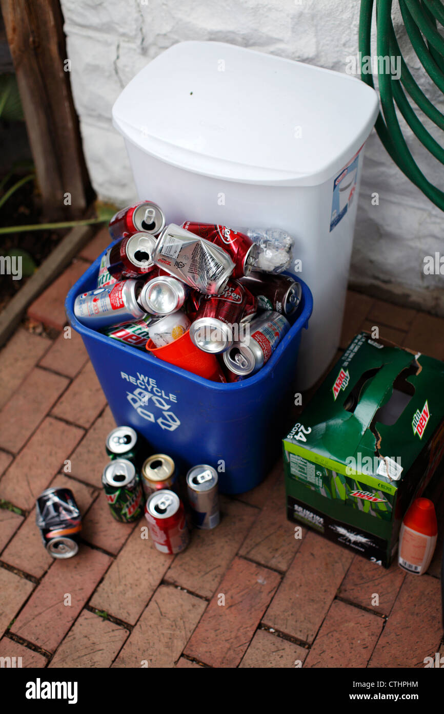 Recycling and trash bins filled with recyclables Stock Photo - Alamy