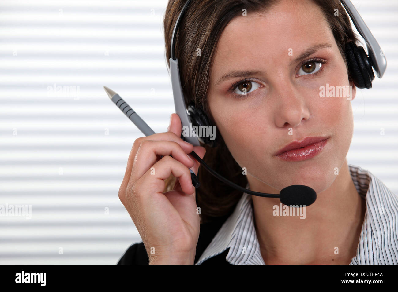 secretary with headset Stock Photo - Alamy