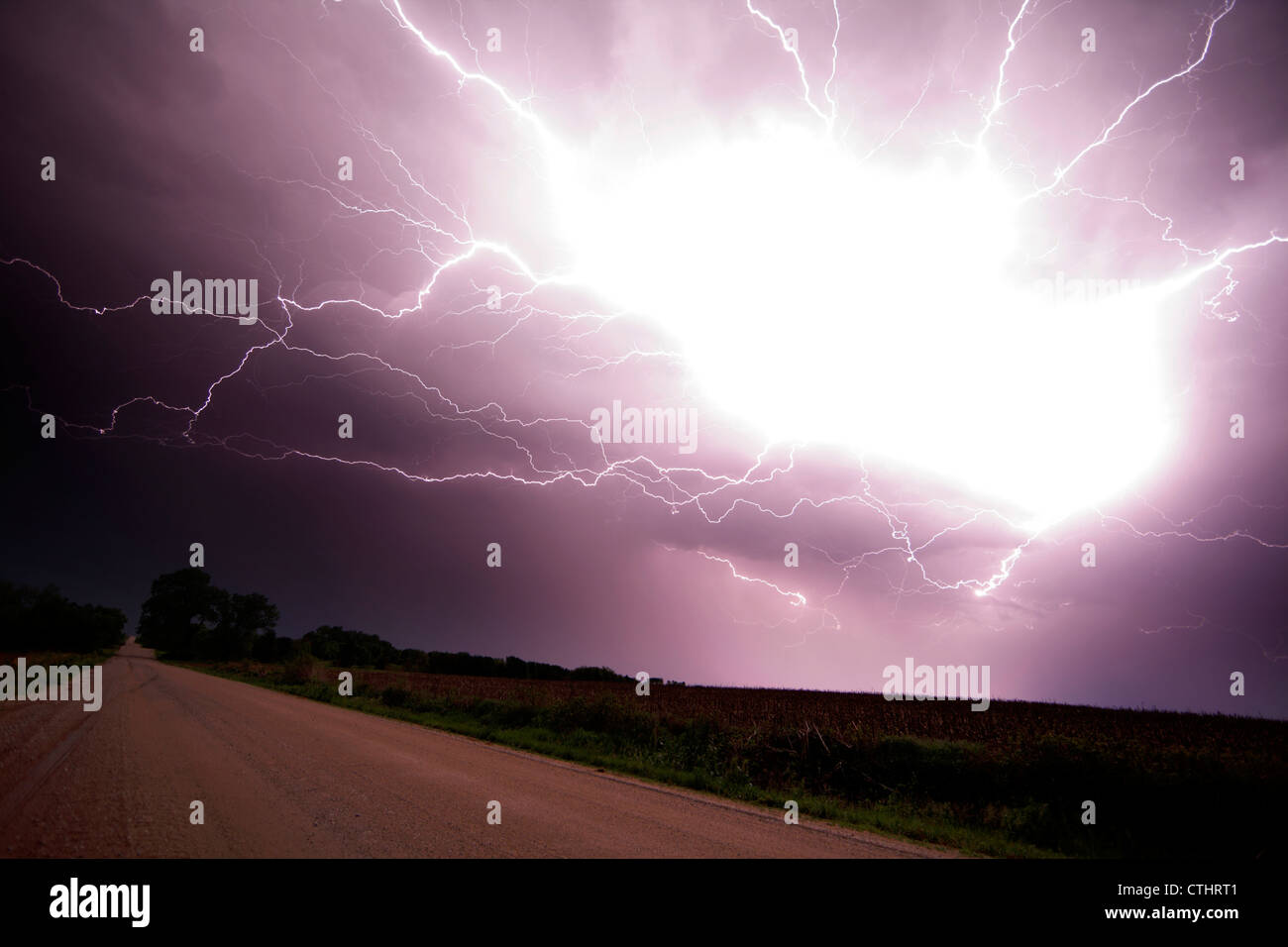 Exploding sky filled lightning radiating hi-res stock photography and ...