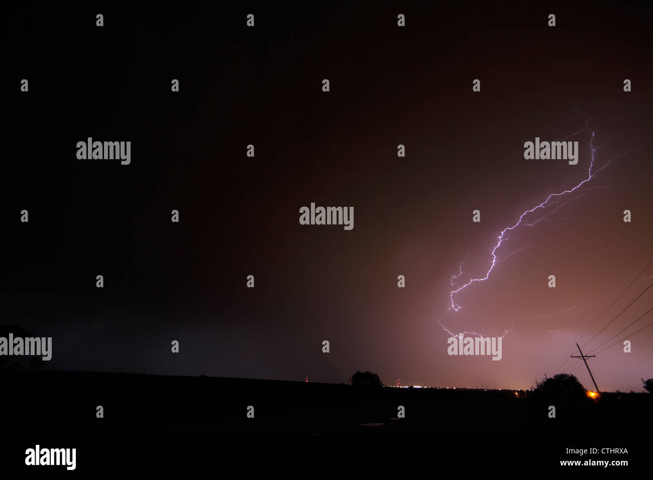 A lightning strike in the country Stock Photo - Alamy