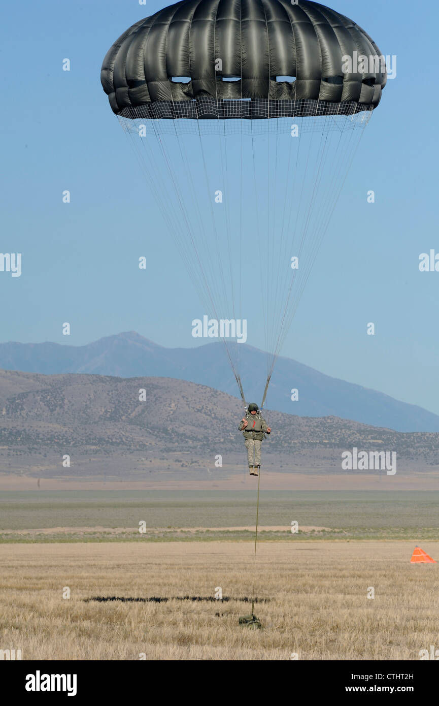 A U.S. Army special forces airborne ranger prepares to land following ...