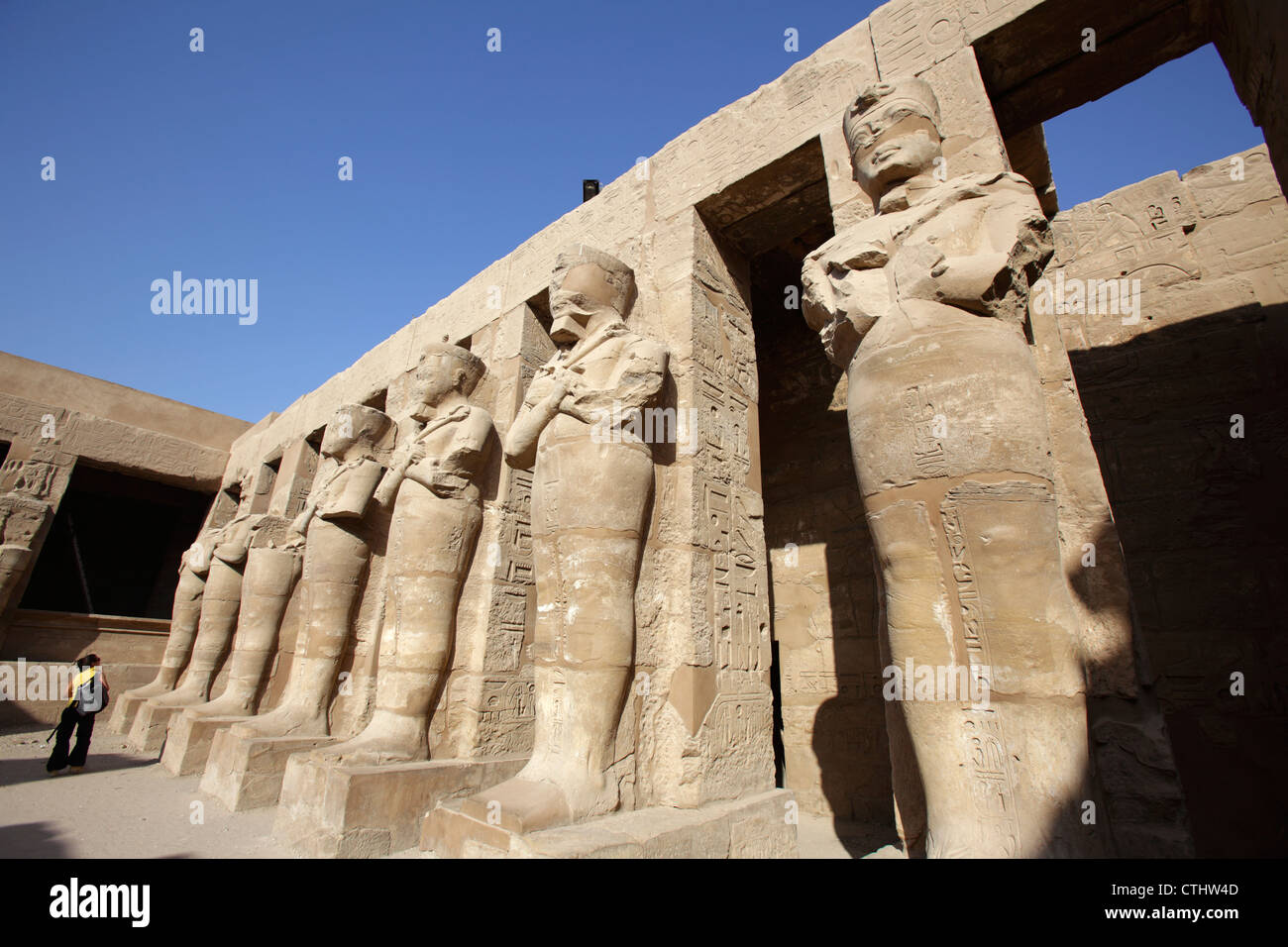 Osirian statues at temple of Pharaoh Ramses III, Karnak Temple Complex ...