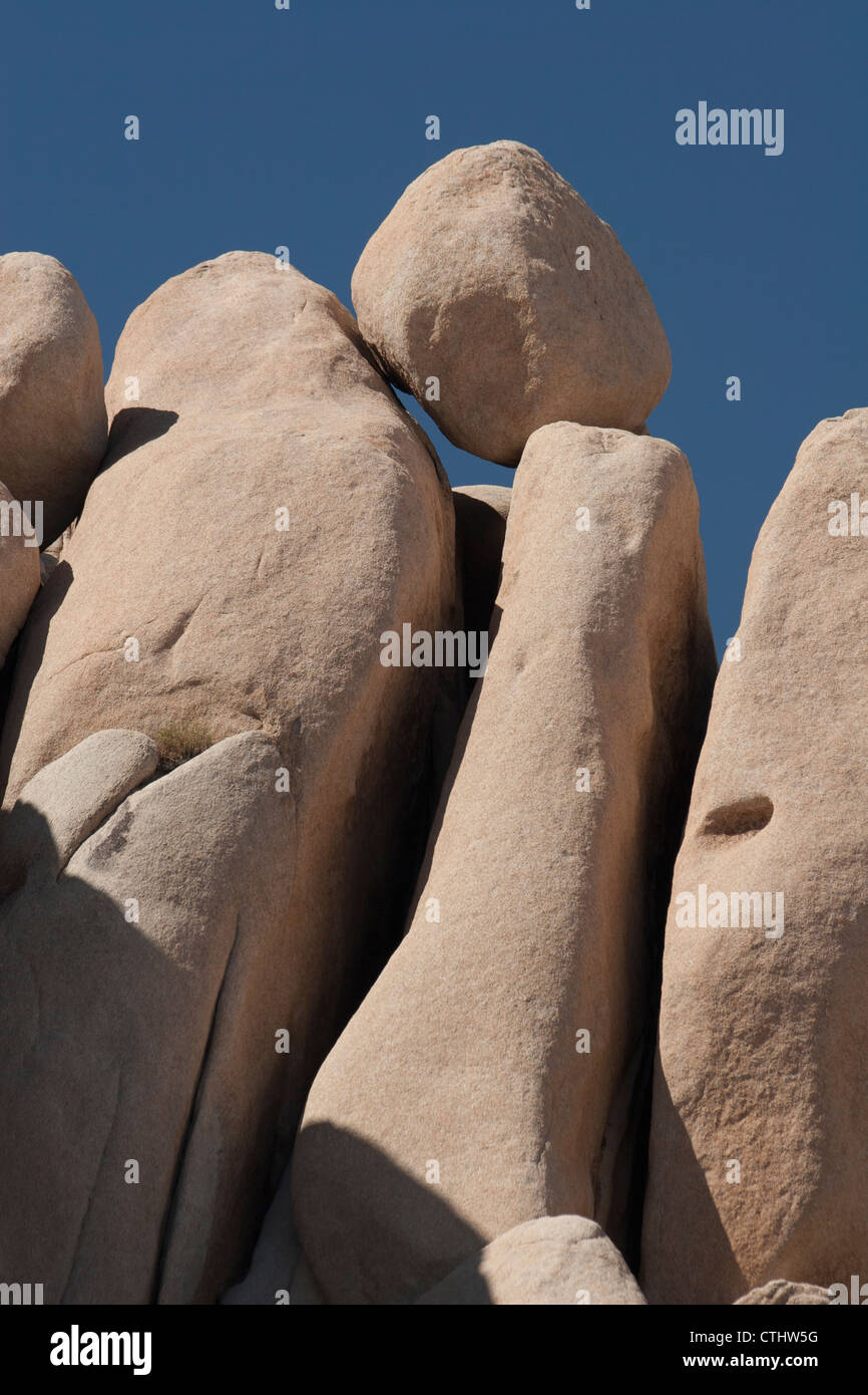 Round Boulder On Top Of Rounded Rock Cliff And Blue Sky; Palm Springs ...