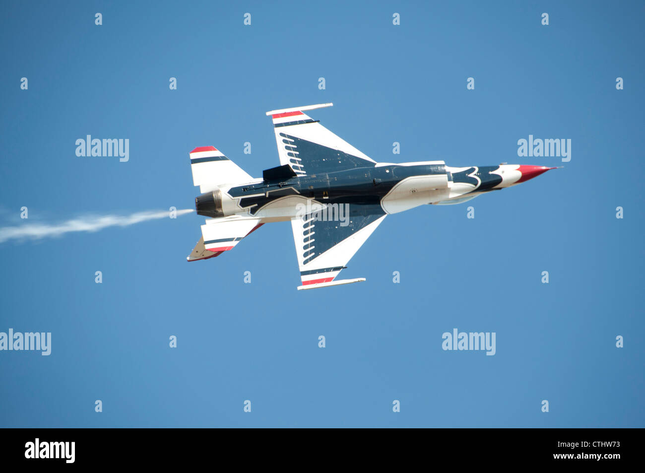 Members of the U.S. Air Force Thunderbirds soar through the sky in ...
