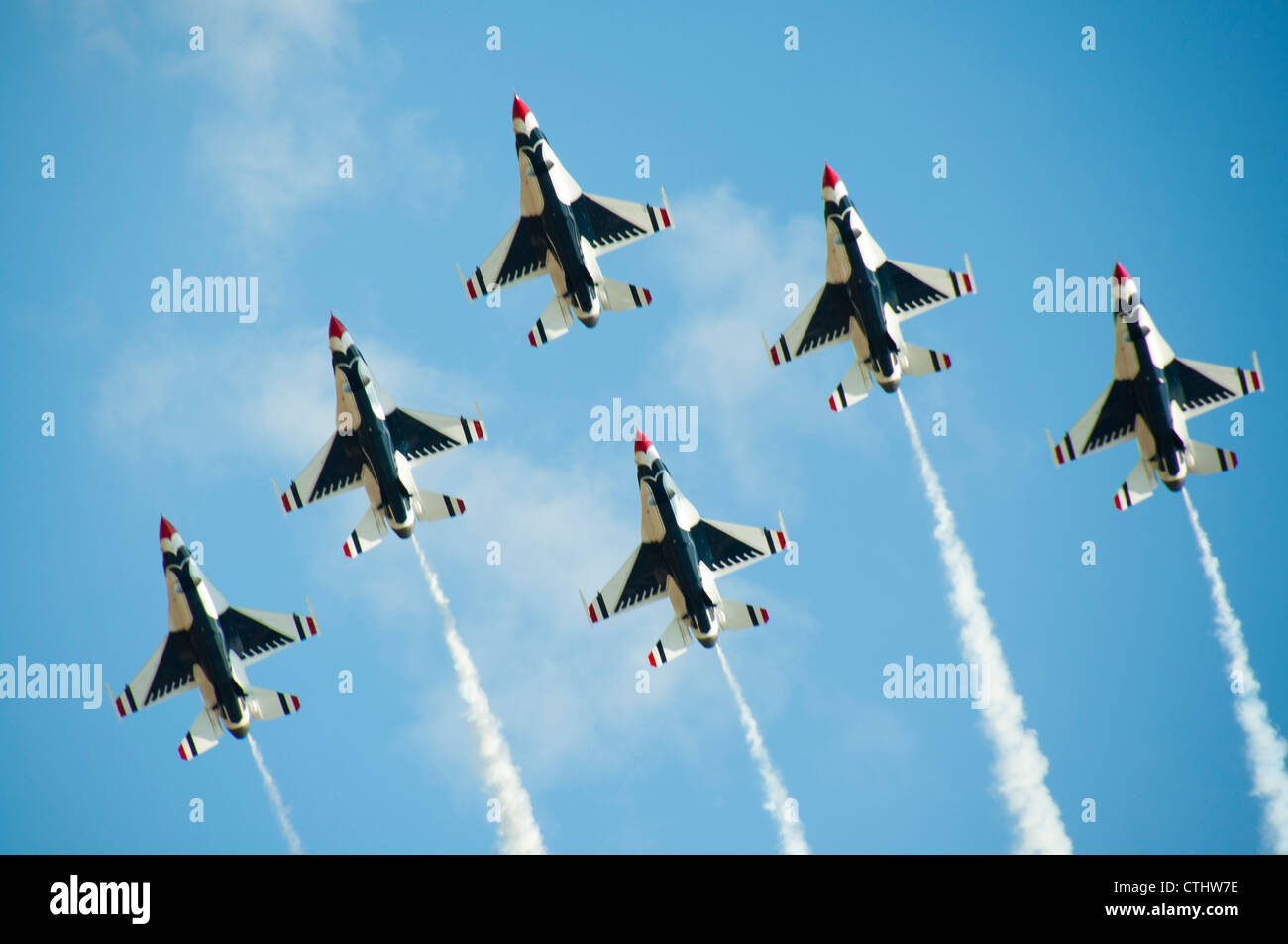 Members of the U.S. Air Force Thunderbirds soar through the sky in ...