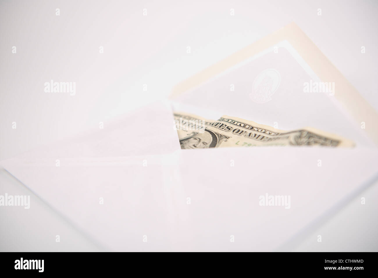 One dollar banknote inside an envelope Stock Photo - Alamy