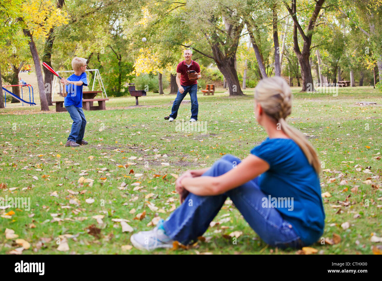 Adult watching children playing sports hi-res stock photography and ...