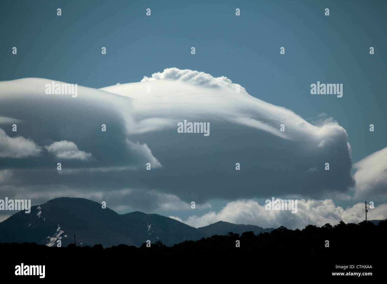 Lenticular cloud formation over the Rocky Mountains in Colorado, with a ...