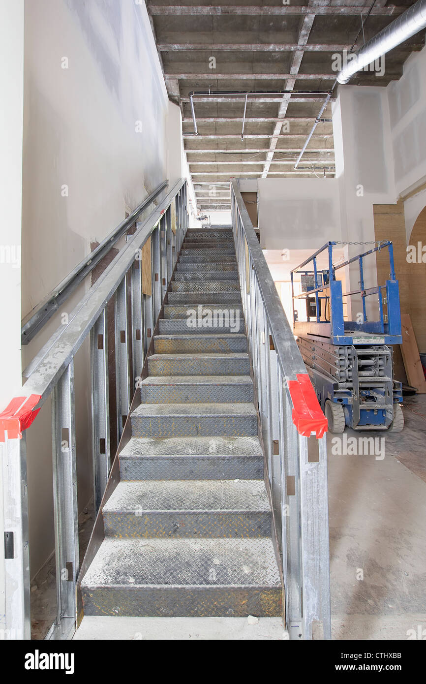 Steel Staircase Construction in Commercial Space Mezzanine with Metal ...