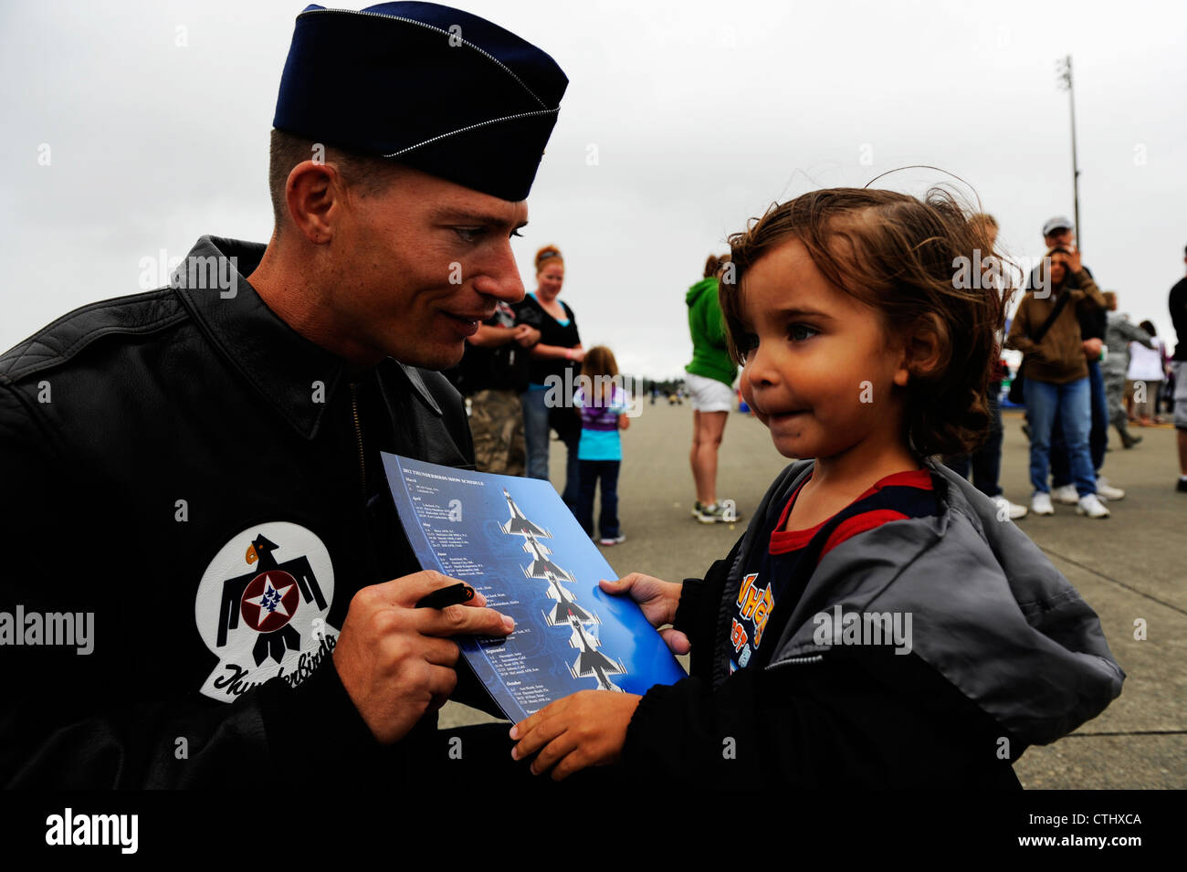 Maj. Nicholas Holmes, Thunderbird 4, Slot pilot, interacts with an ...