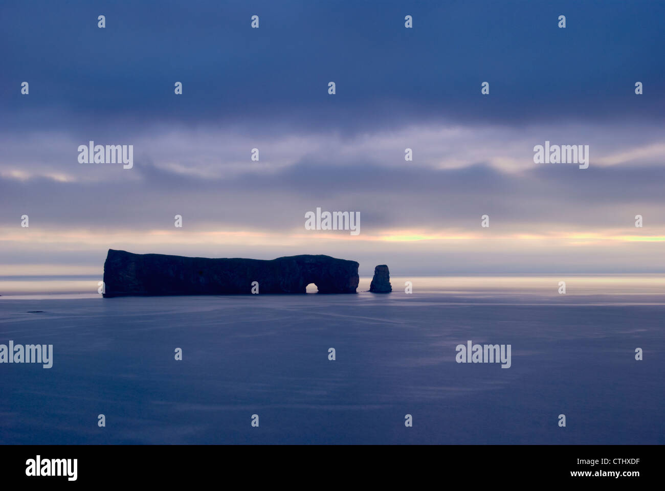 Rock Formation Perce Rock In The Water In Shades Of Blue; Perce ,Quebec ...