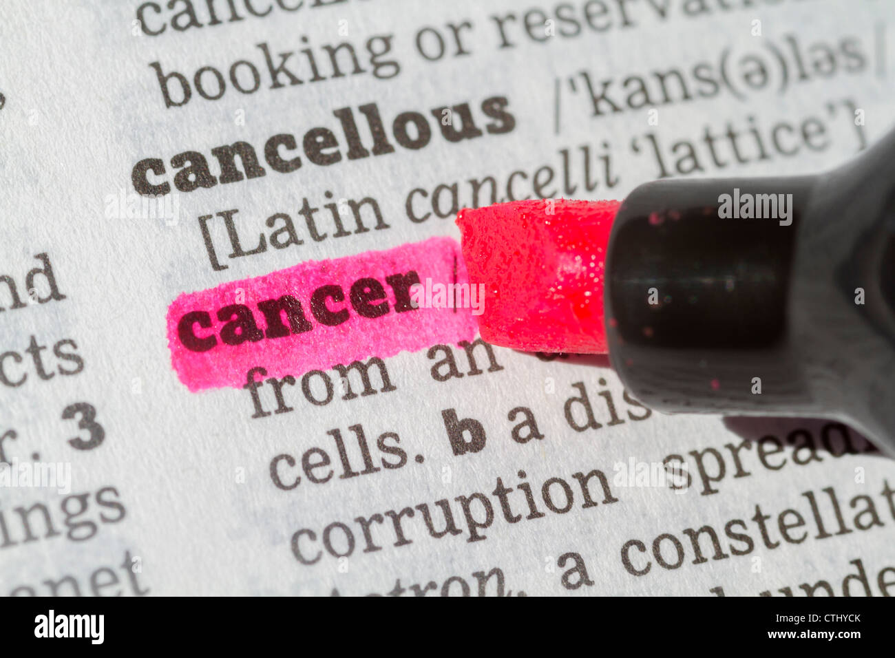Cancer highlighted in dictionary with pen closeup Stock Photo - Alamy