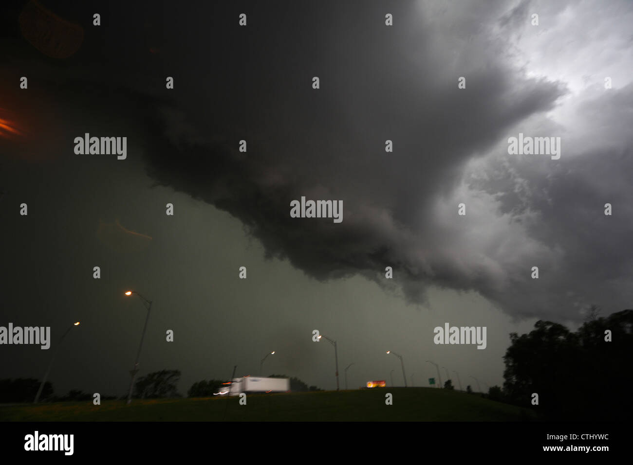 The front edge of a squall line thunderstorm opening up showing green ...