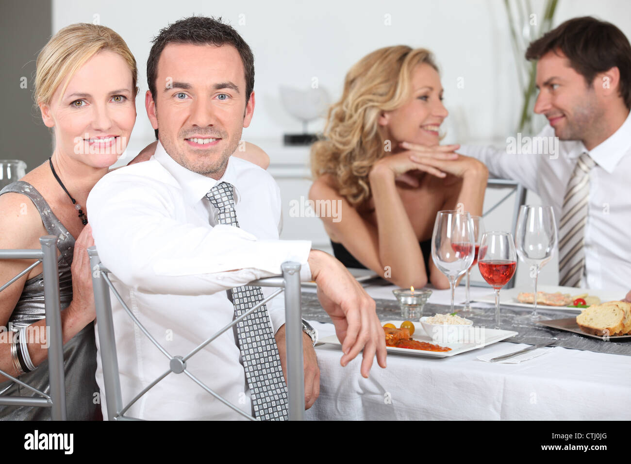 Friends having dinner Stock Photo - Alamy