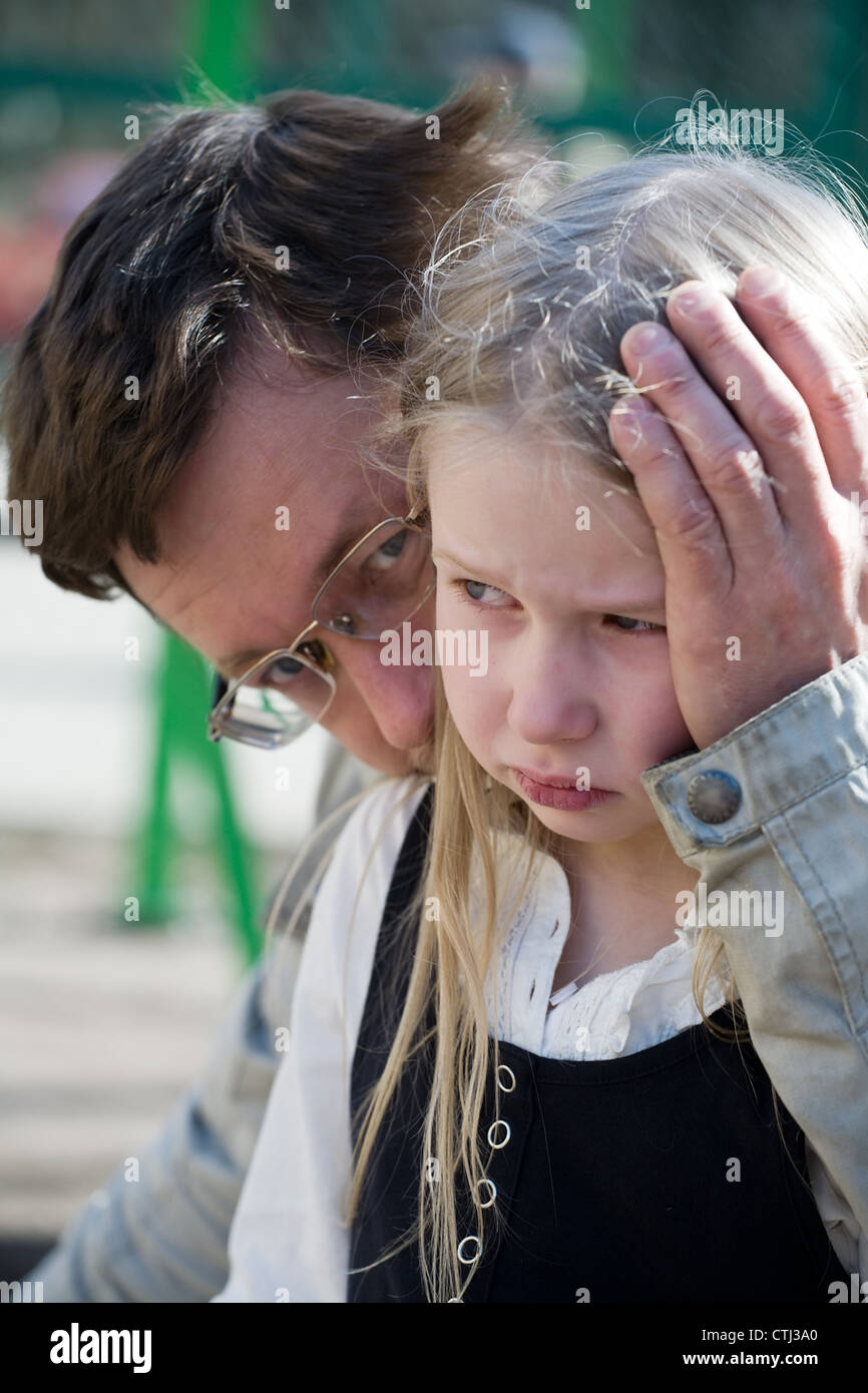 faces of father and sad weeping daughter closeup Stock Photo - Alamy