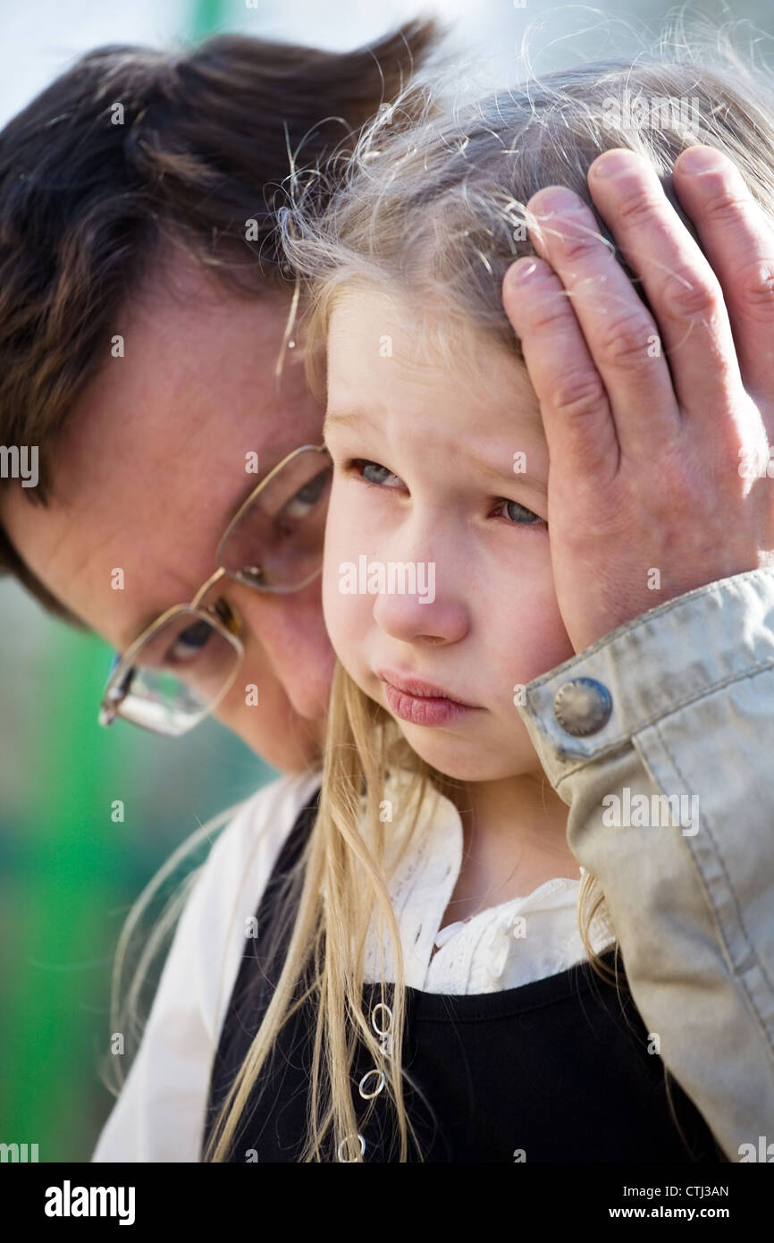 faces of father and sad weeping daughter closeup Stock Photo - Alamy