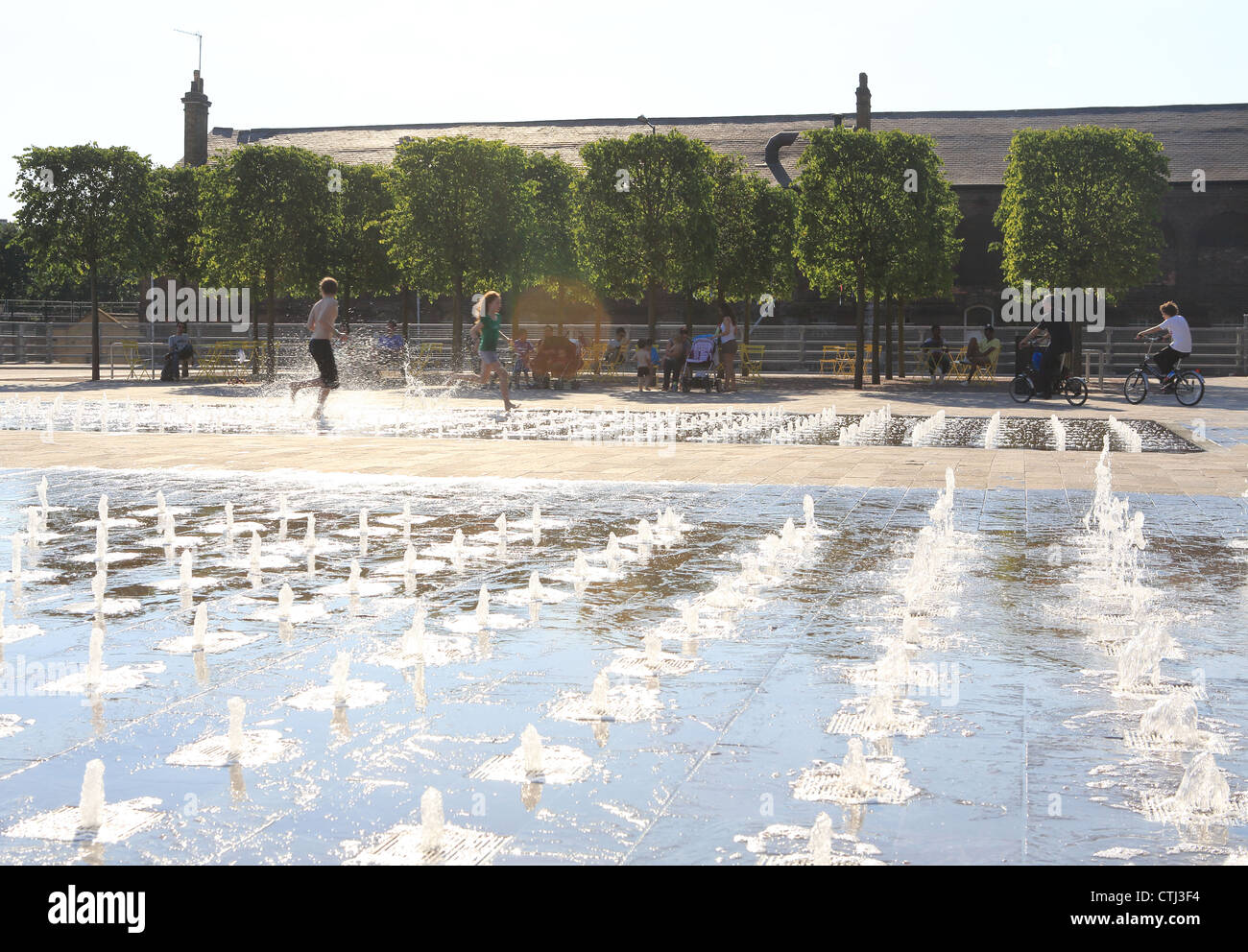 The fountains in Granary Square, in the King's Cross regeneration area ...