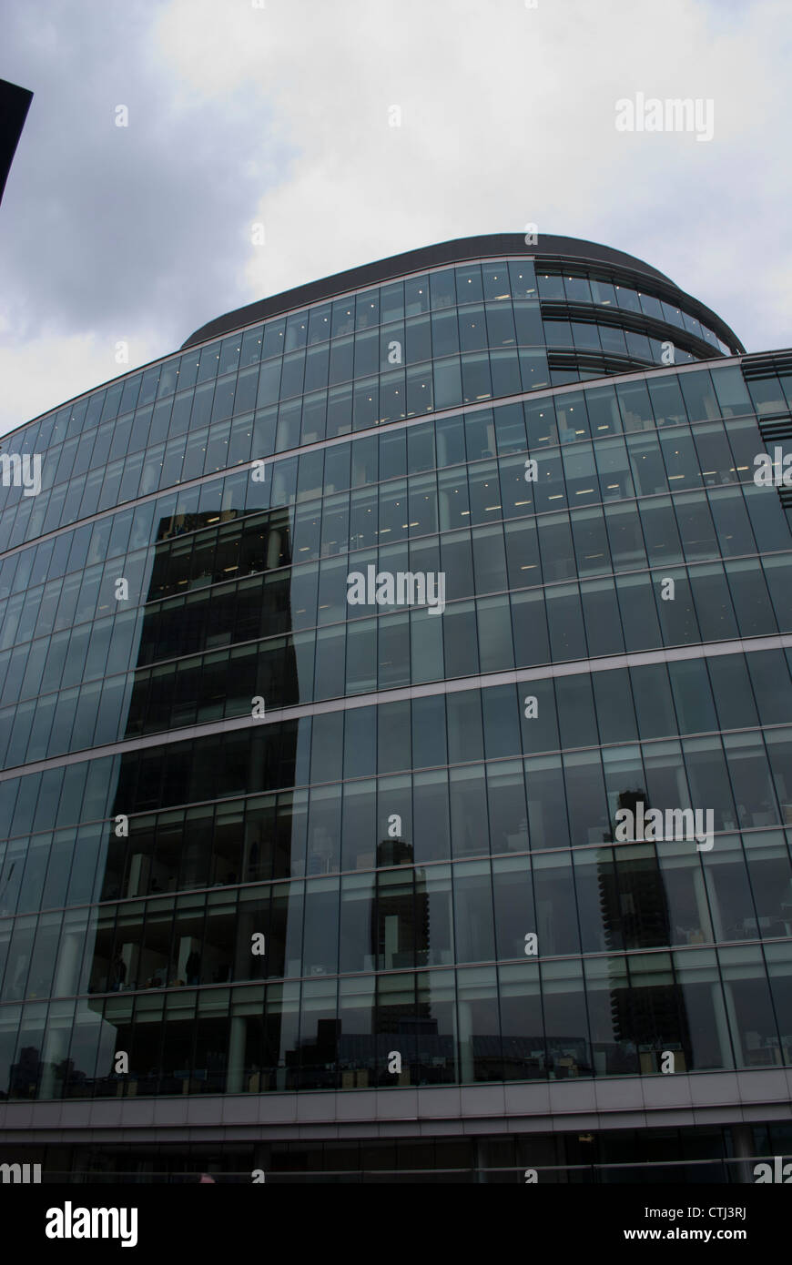 Tall buildings reflected in glass fronted building near the Museum Of ...