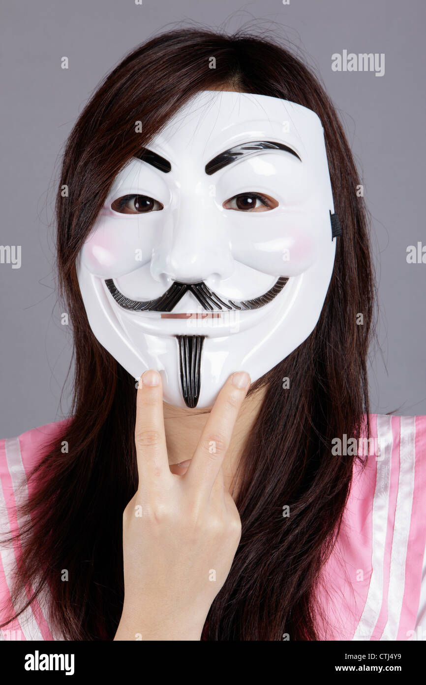 School girl wears V mask Stock Photo - Alamy