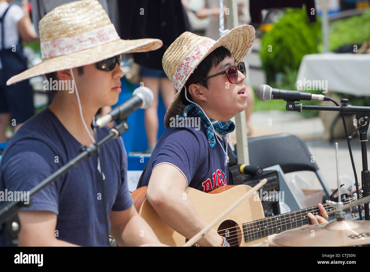 July 8, 2012 - Seoul, Korea. Two Korean men perform their music ...
