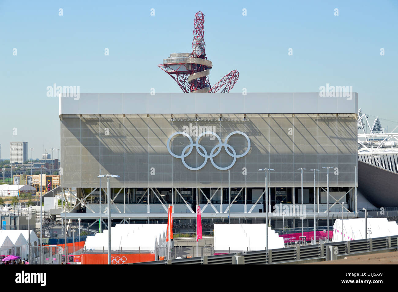 Olympic Rings on the Aquatics Centre with The ArcelorMittal Orbit Tower ...