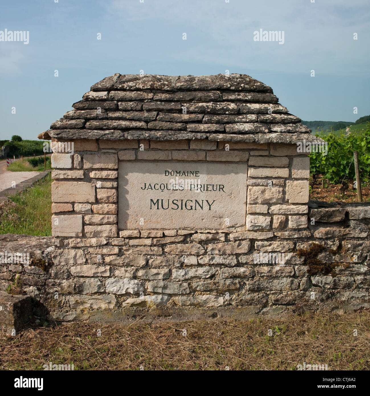 Domaine Jacques Prieur Musigny Grand Cru vineyard wall stone sign above ...