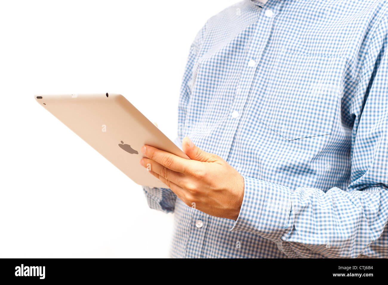 man using an iPad tablet Stock Photo - Alamy