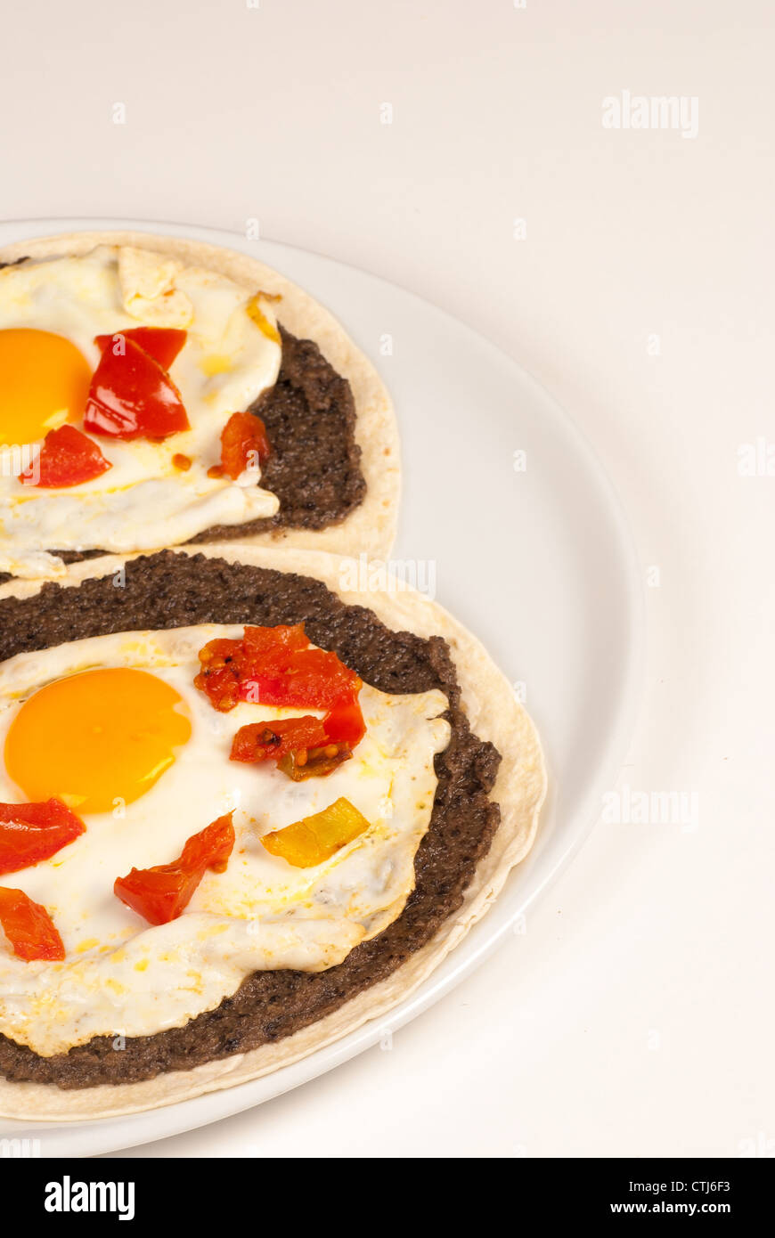 Rustic Mexican egg breakfast, traditional huevos rancheros Stock Photo ...