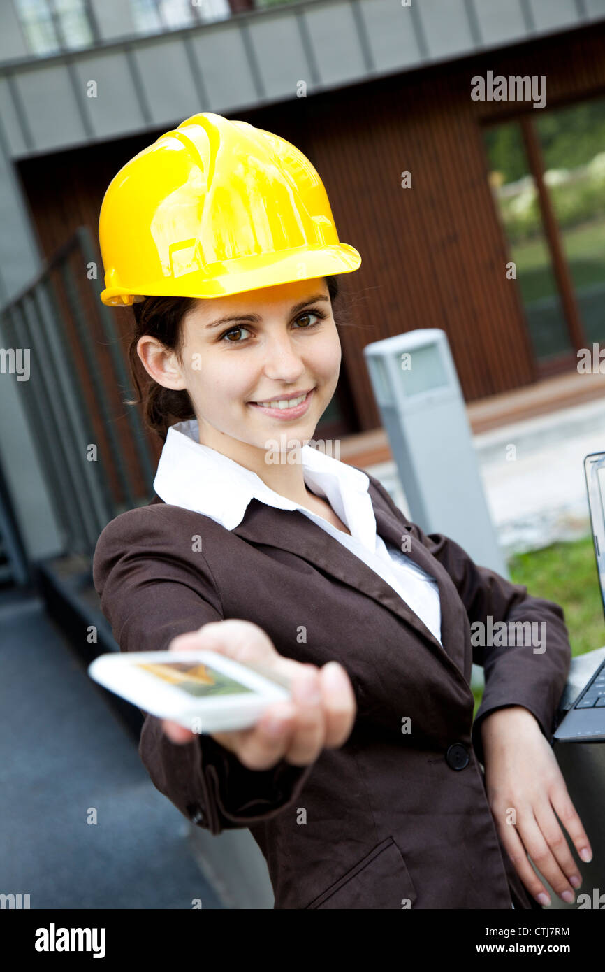 Female construction engineer calling Stock Photo - Alamy