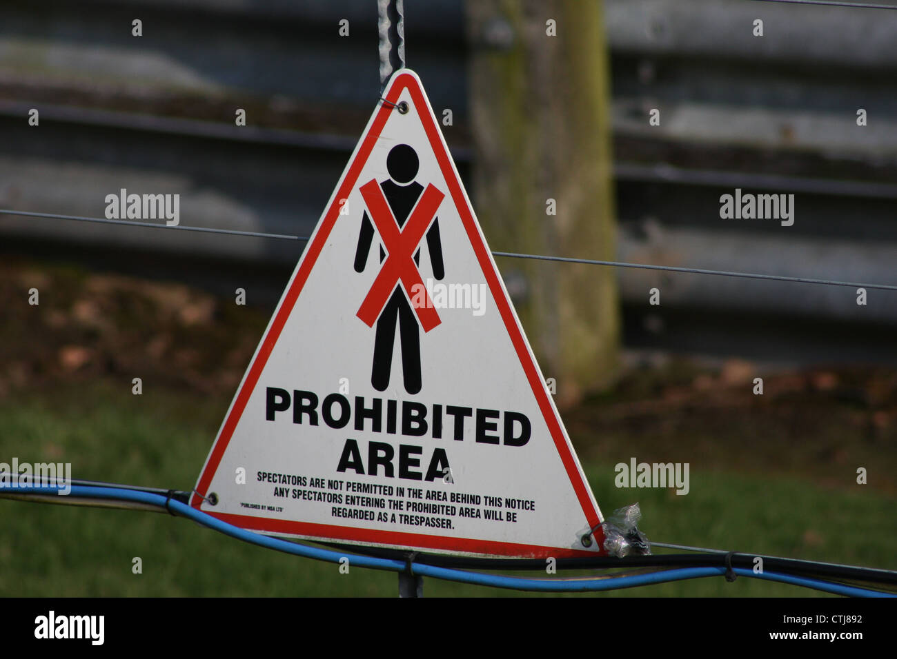 close up of a triangular prohibited area warning sign Stock Photo - Alamy