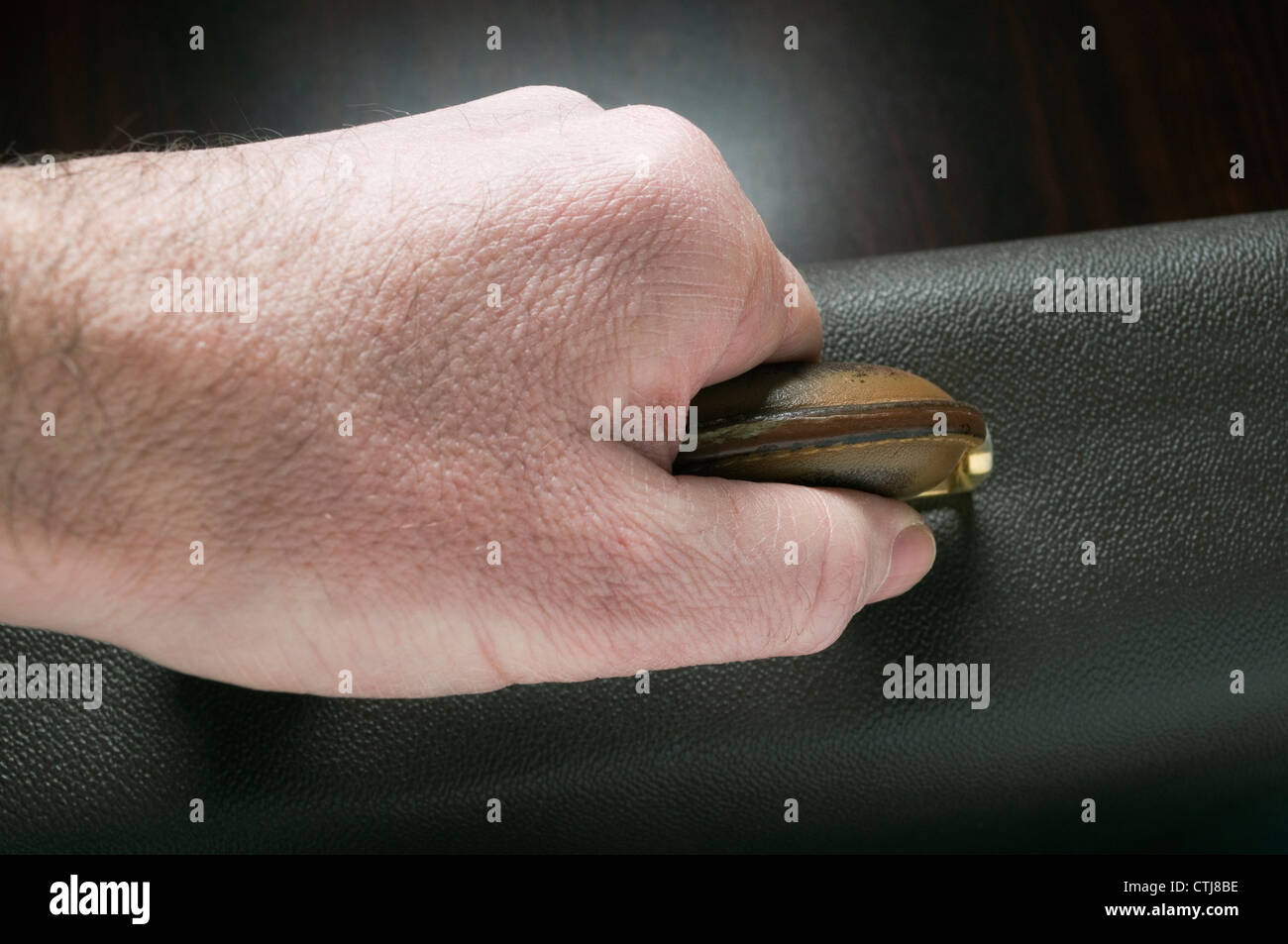 Hand Holding Briefcase Stock Photo - Alamy