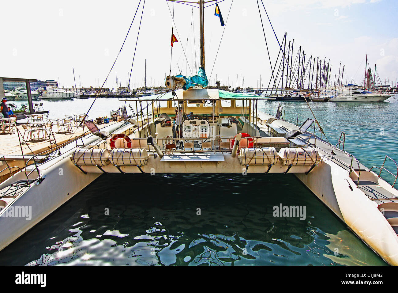 preparing to sail modern catamaran Stock Photo - Alamy
