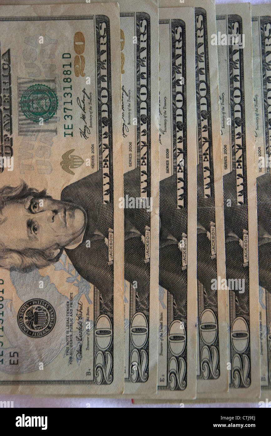 Small pile of american money Stock Photo - Alamy