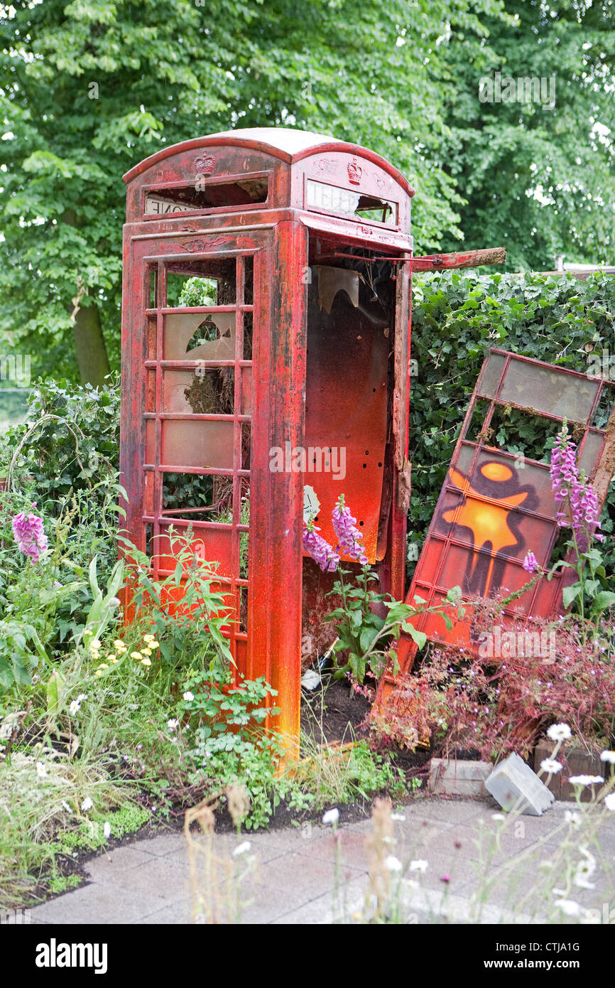 An overgrown telephone box at RHS Hampton Court Palace flower show 2012 ...