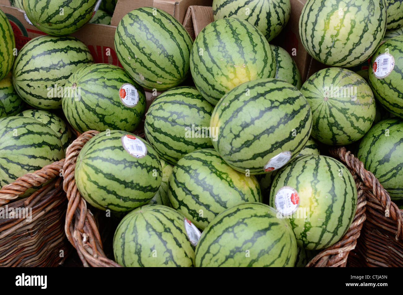 Watermelons on display outside a shop Stock Photo - Alamy