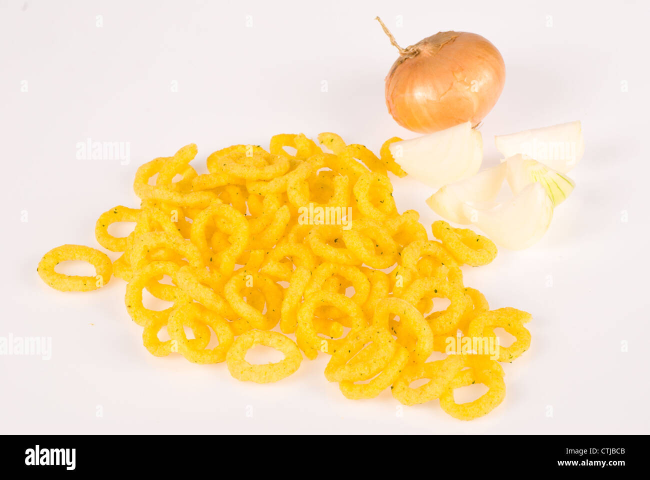 Crunchy onion flavored maize snacks and their ingredient Stock Photo ...