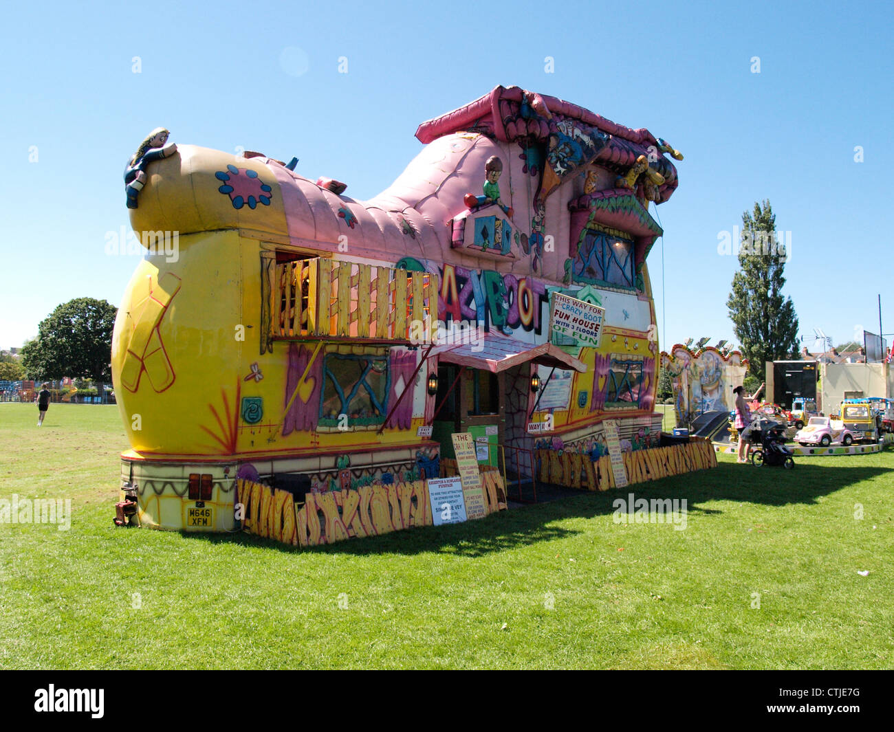 Boot shaped fun house, UK Stock Photo - Alamy