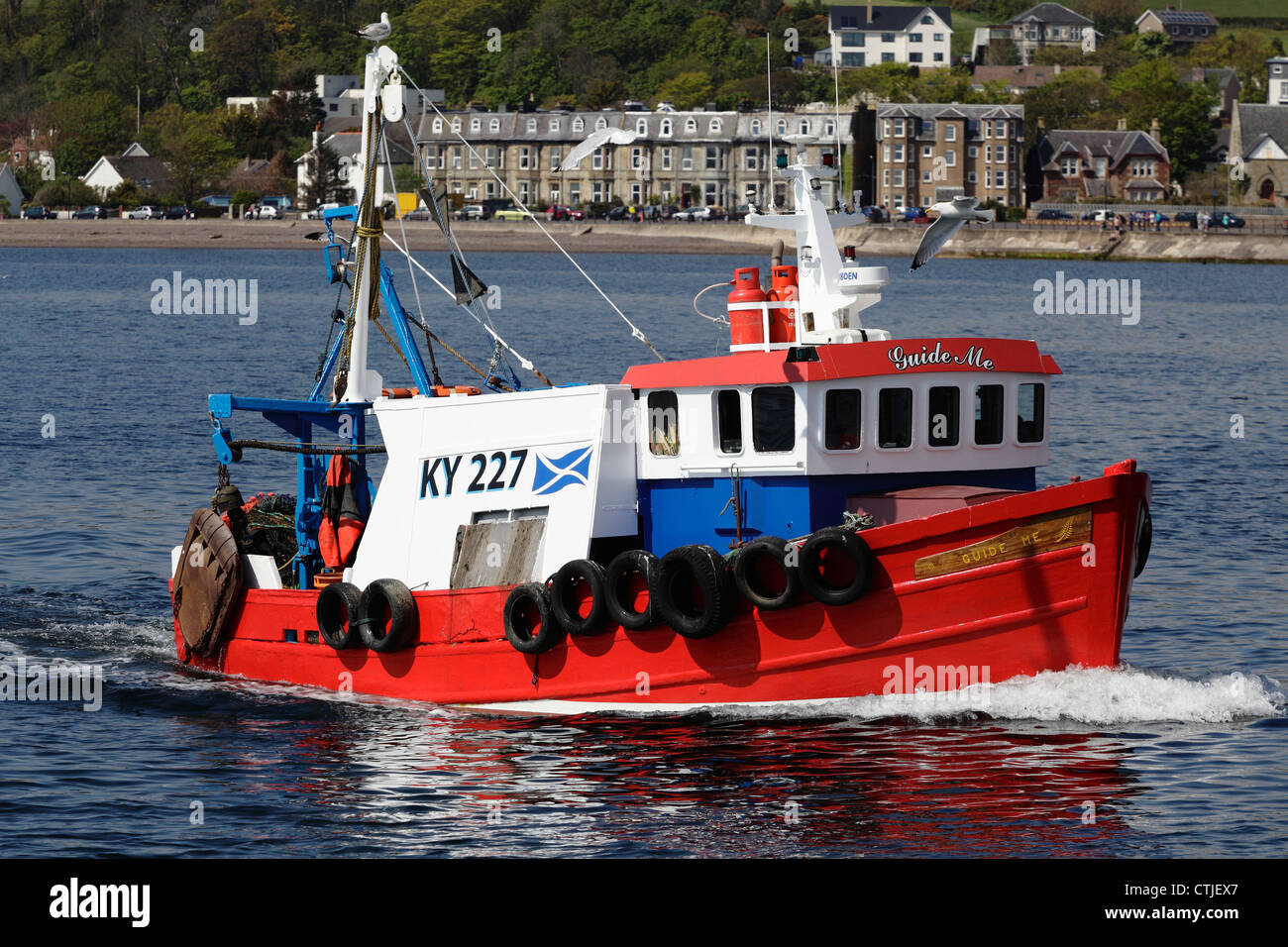 Small fishing boat Guide Me sailing off Largs in the Firth of Clyde ...