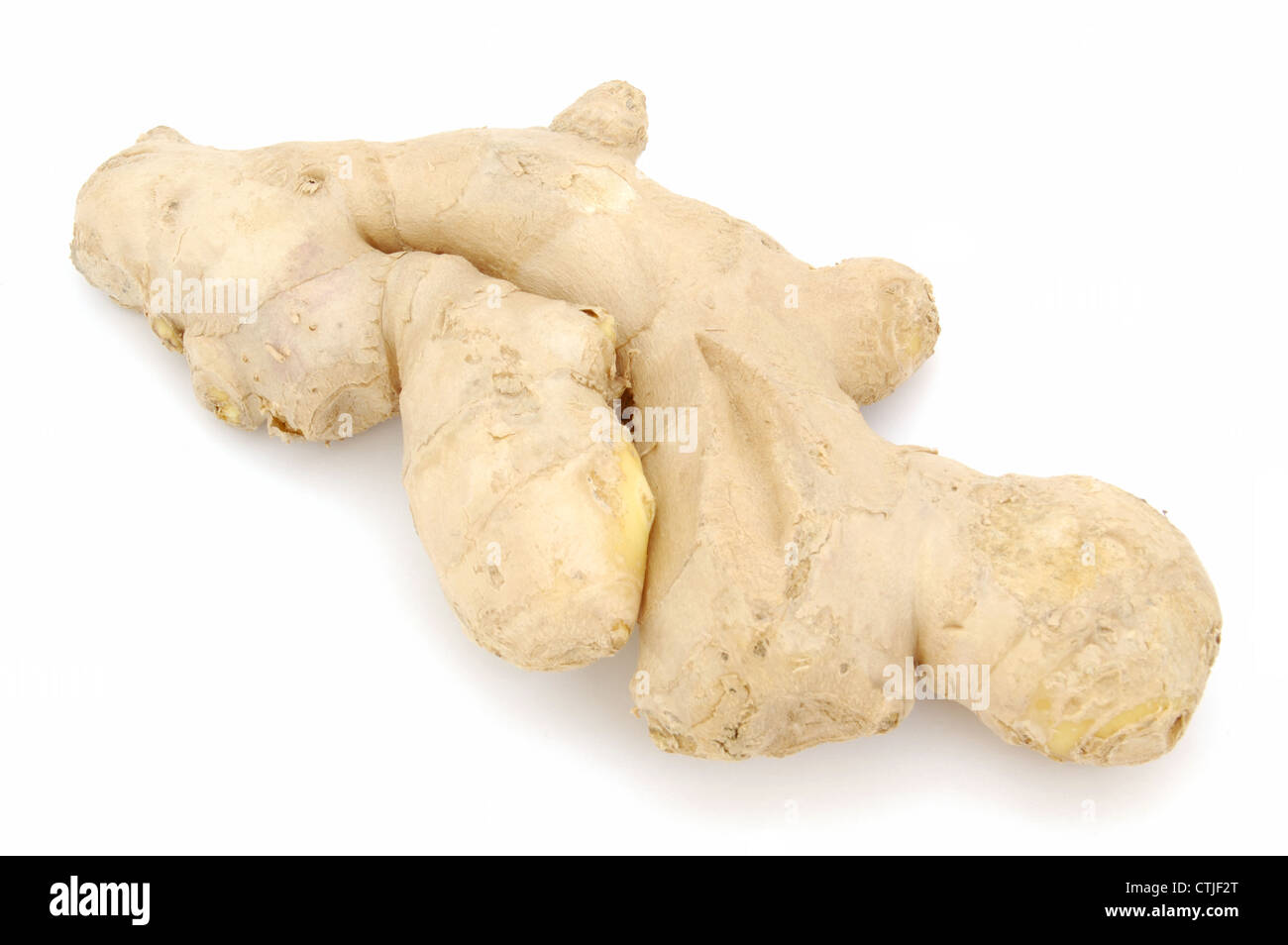 Piece of root ginger isolated on a white background Stock Photo - Alamy