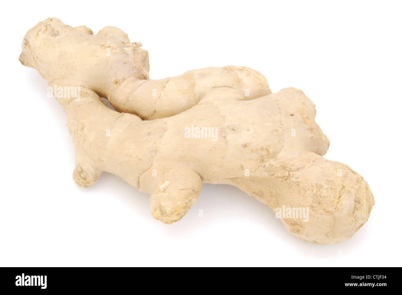 Piece of root ginger isolated on a white background Stock Photo - Alamy