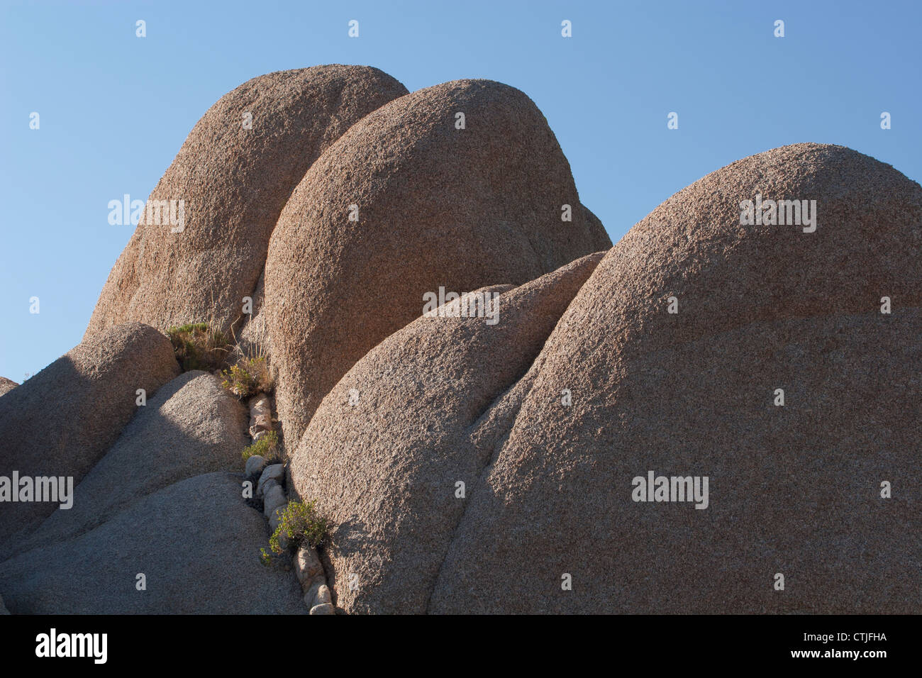 Close Up Of Rounded Rocks And Blue Sky; Palm Springs, California ...