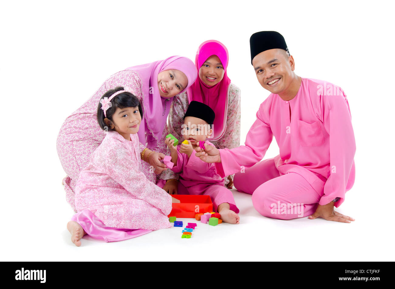Happy muslim family in Cut Out Stock Images & Pictures - Alamy