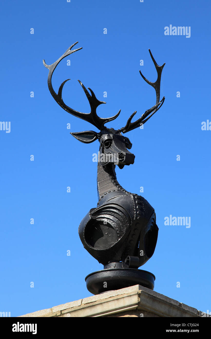 Metal sculpture of a stag's head outside Huntsham Court near to Symonds ...