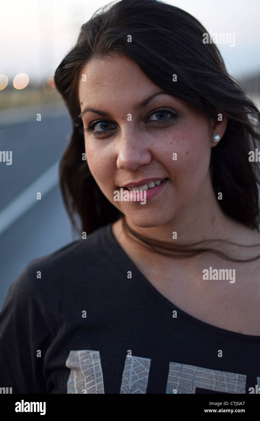 Exterior portrait of cute young woman Stock Photo - Alamy