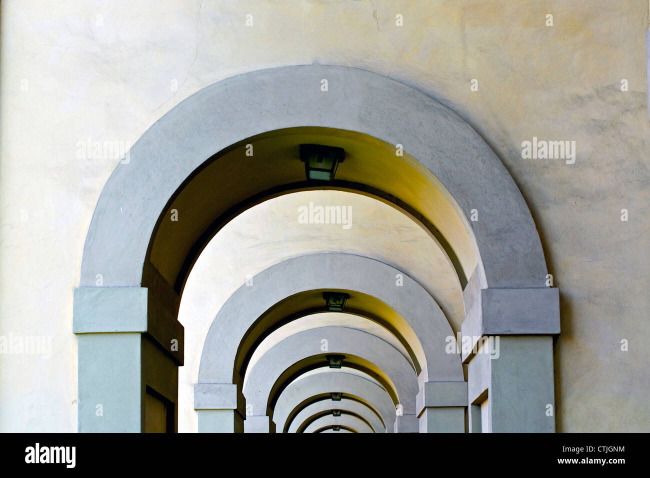 Series of concrete arches in Italy Florance Stock Photo - Alamy
