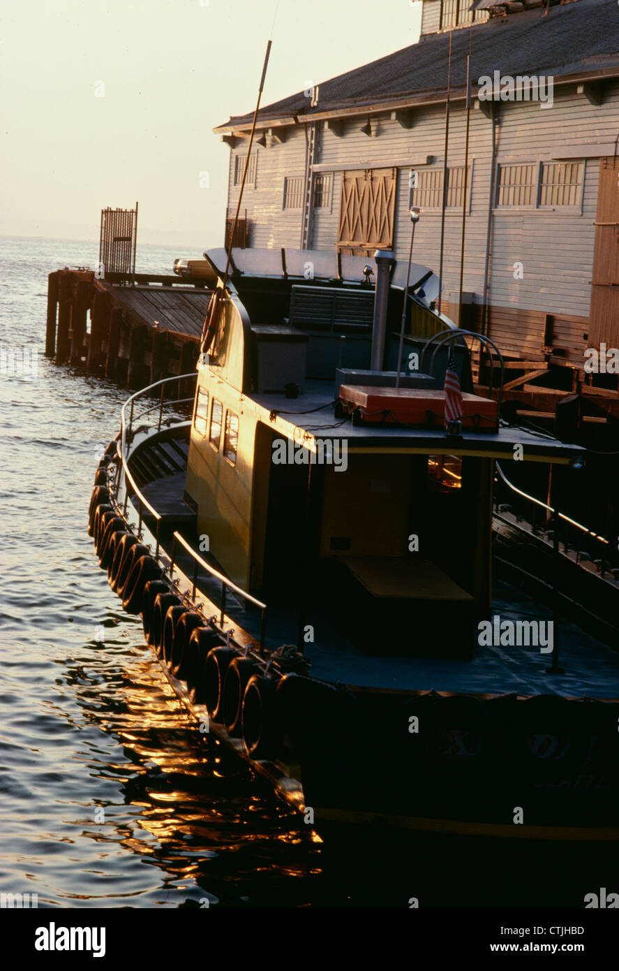 Tugboat docked at pier, Seattle, WA , USA Stock Photo - Alamy
