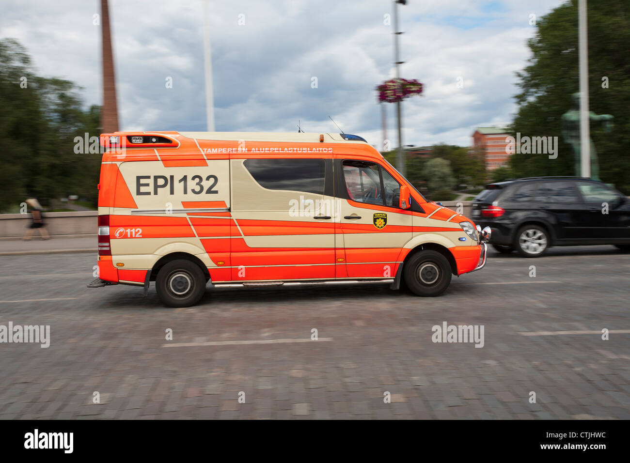 Ambulance in motion, Tampere Finland Stock Photo - Alamy